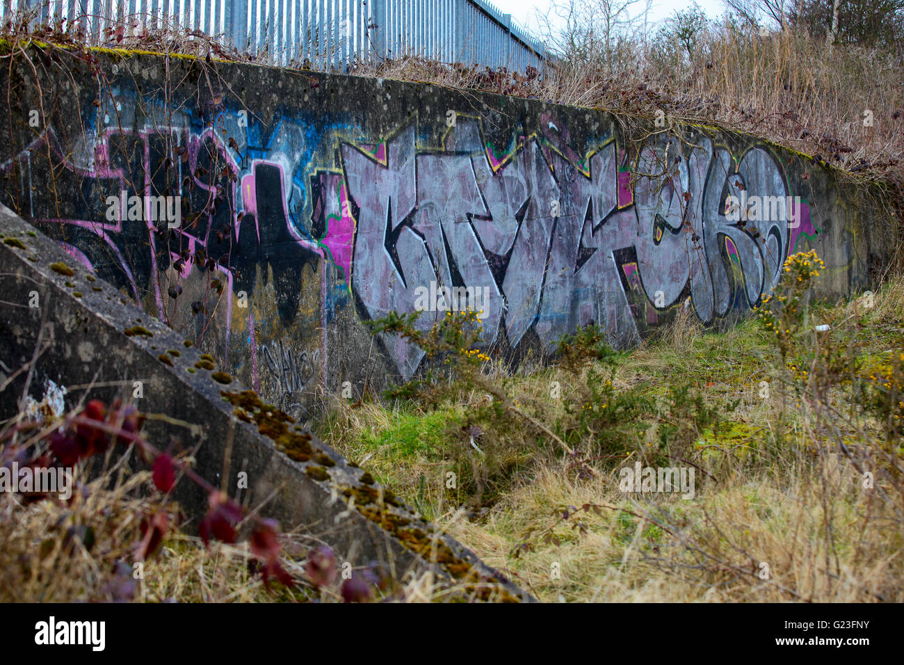 Graffiti painted on a wall,regarded as a form of art and other times ...