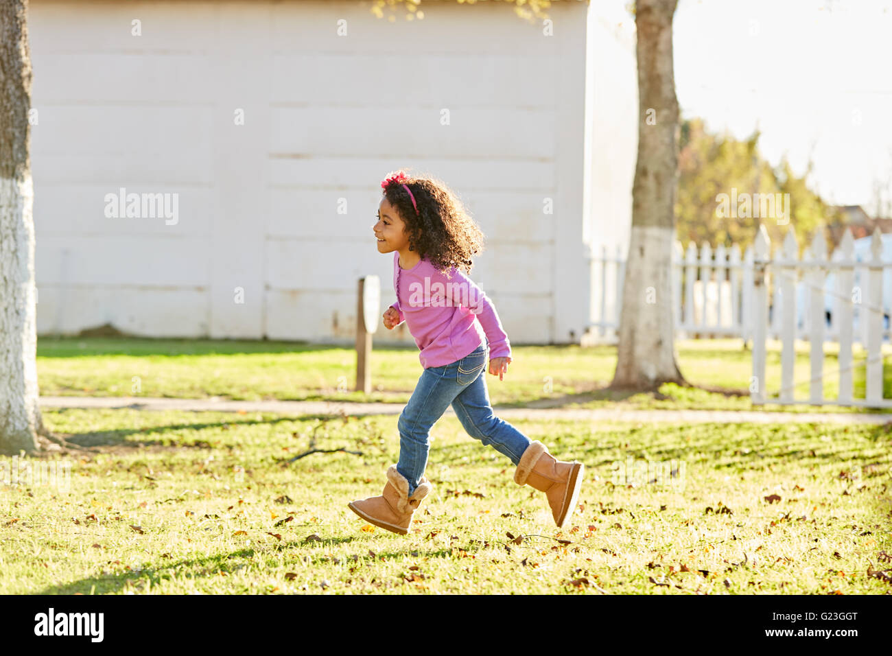 kid girl toddler playing running in park outdoor latin ethnicity Stock ...