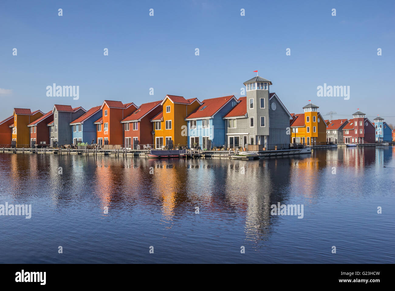 Colorful houses reitdiephaven harbor hi-res stock photography and ...