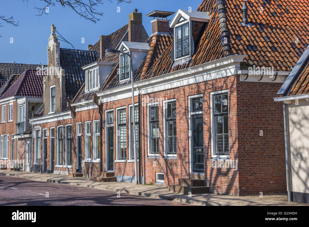 Traditional Dutch houses in the center of Dokkum, Holland Stock Photo ...