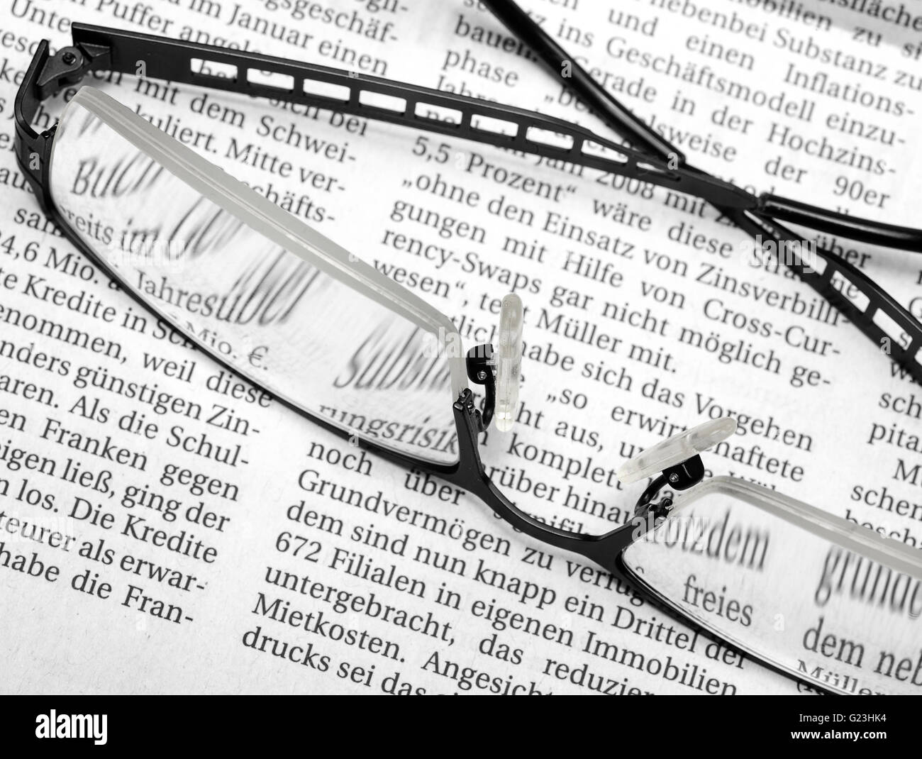 Newspaper optics hi-res stock photography and images - Alamy