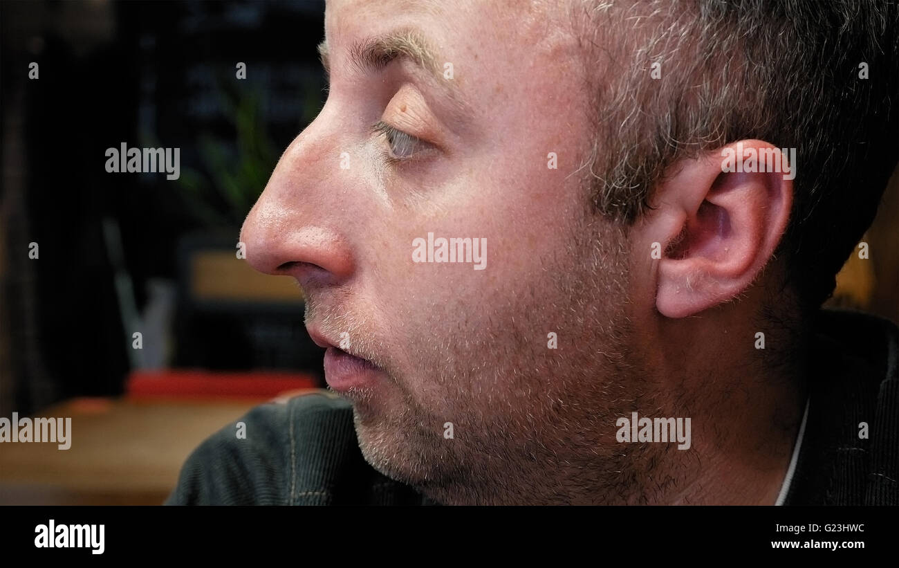 Pensive man emotional close portrait with eyes Stock Photo - Alamy