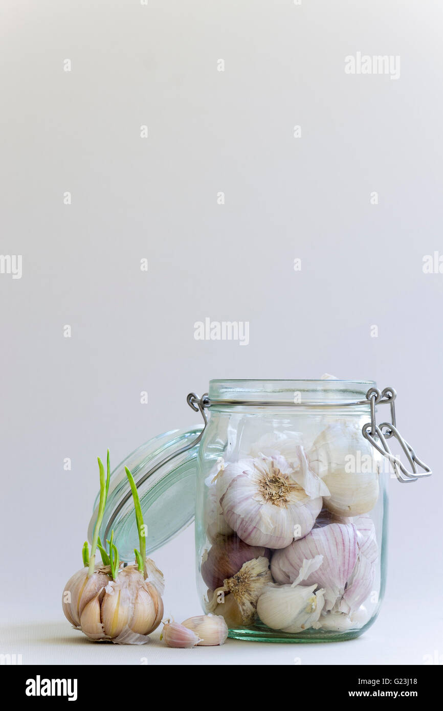 Garlic in a jar Stock Photo - Alamy