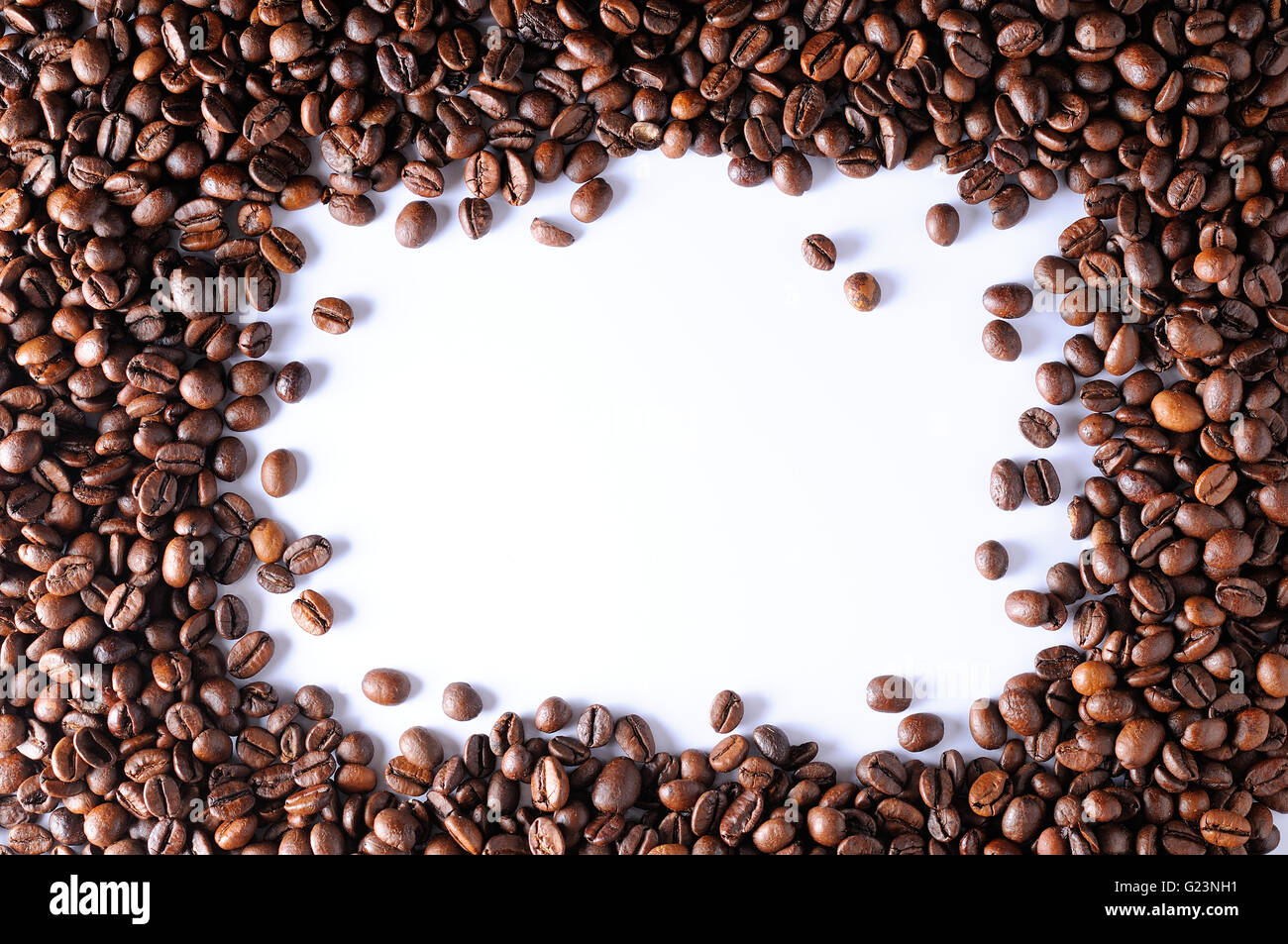 Background of a group of roasted coffee framing with white background ...