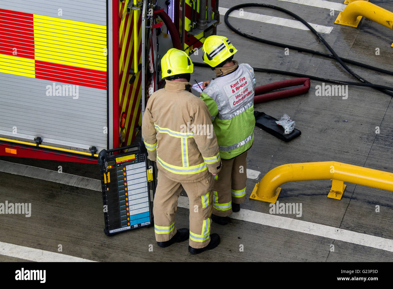 Firefighters using a Telemetry Breathing Apparatus Control Board during ...