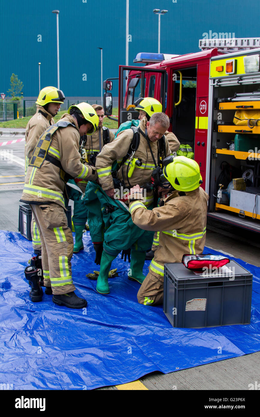 Firefighter in chemical protection suit hi-res stock photography and ...