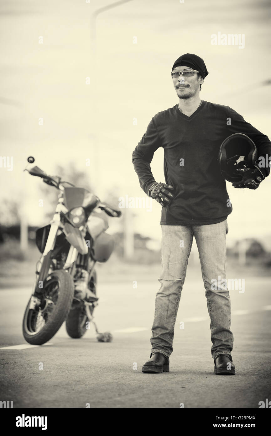 Man Standing Behind Motorcycle High Resolution Stock Photography and ...