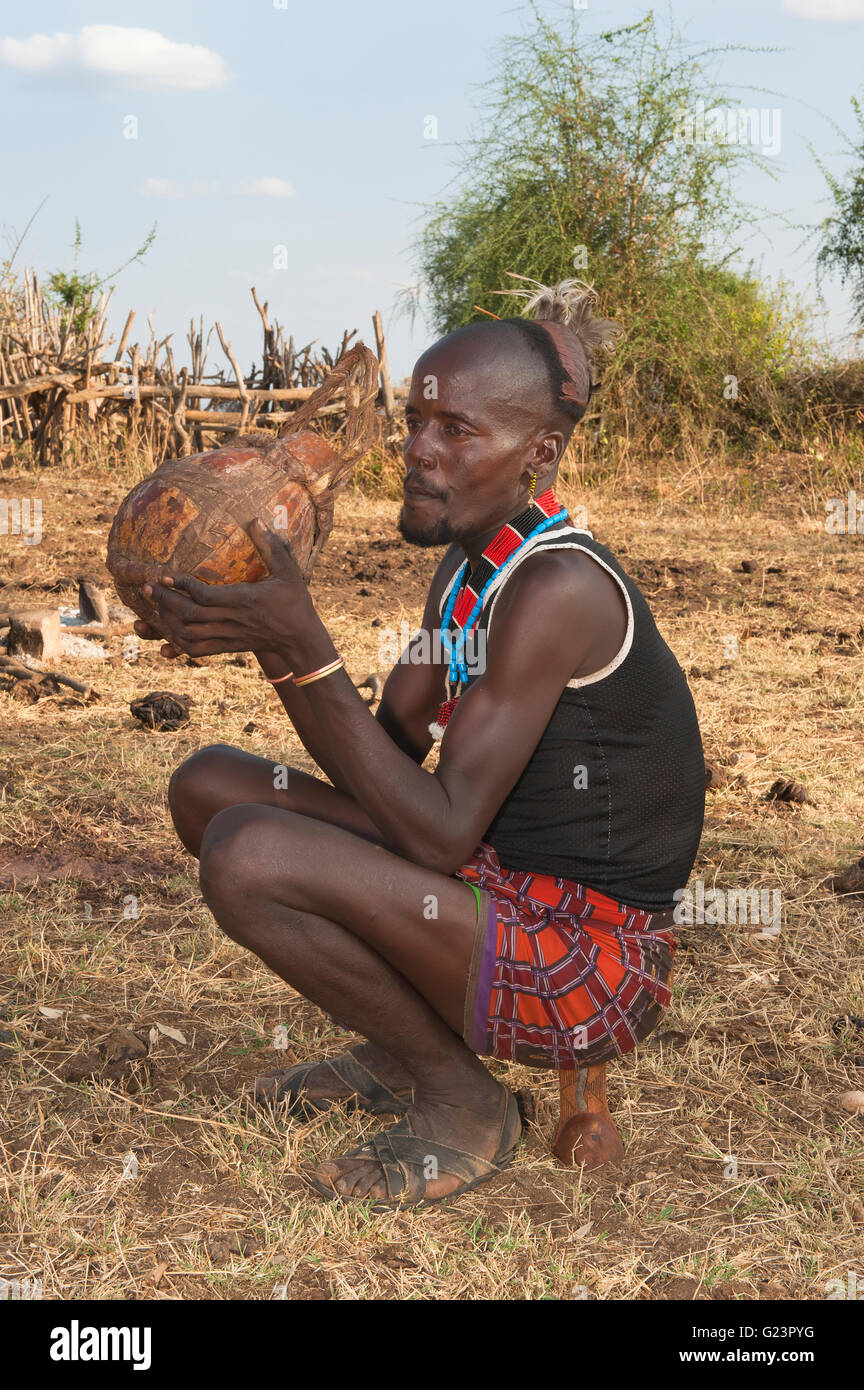 Hamar man drinking sorghum beer from a calabash, Omo river valley ...