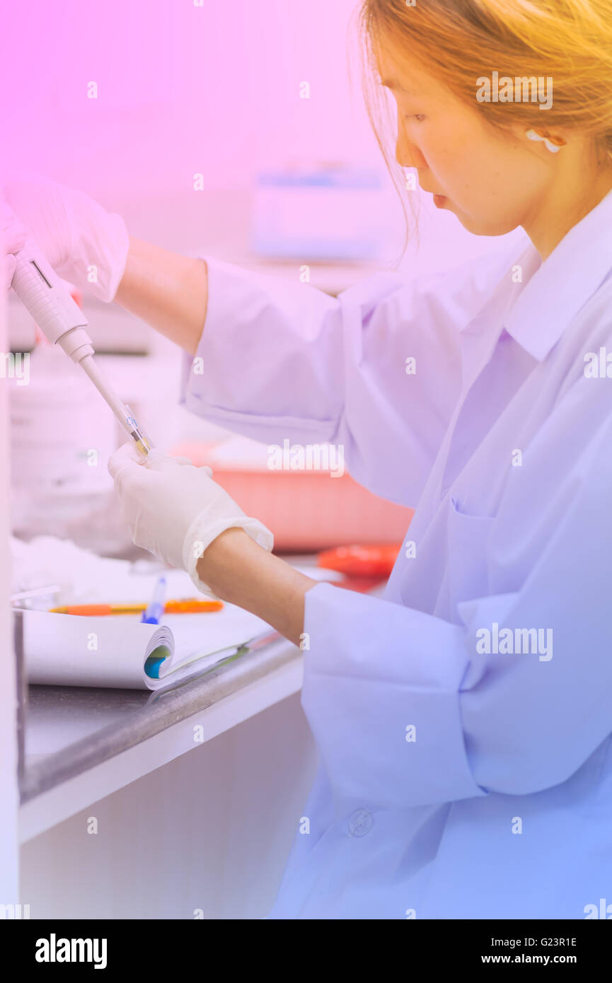 Asia women medical technology doing research in laboratory hospital ...