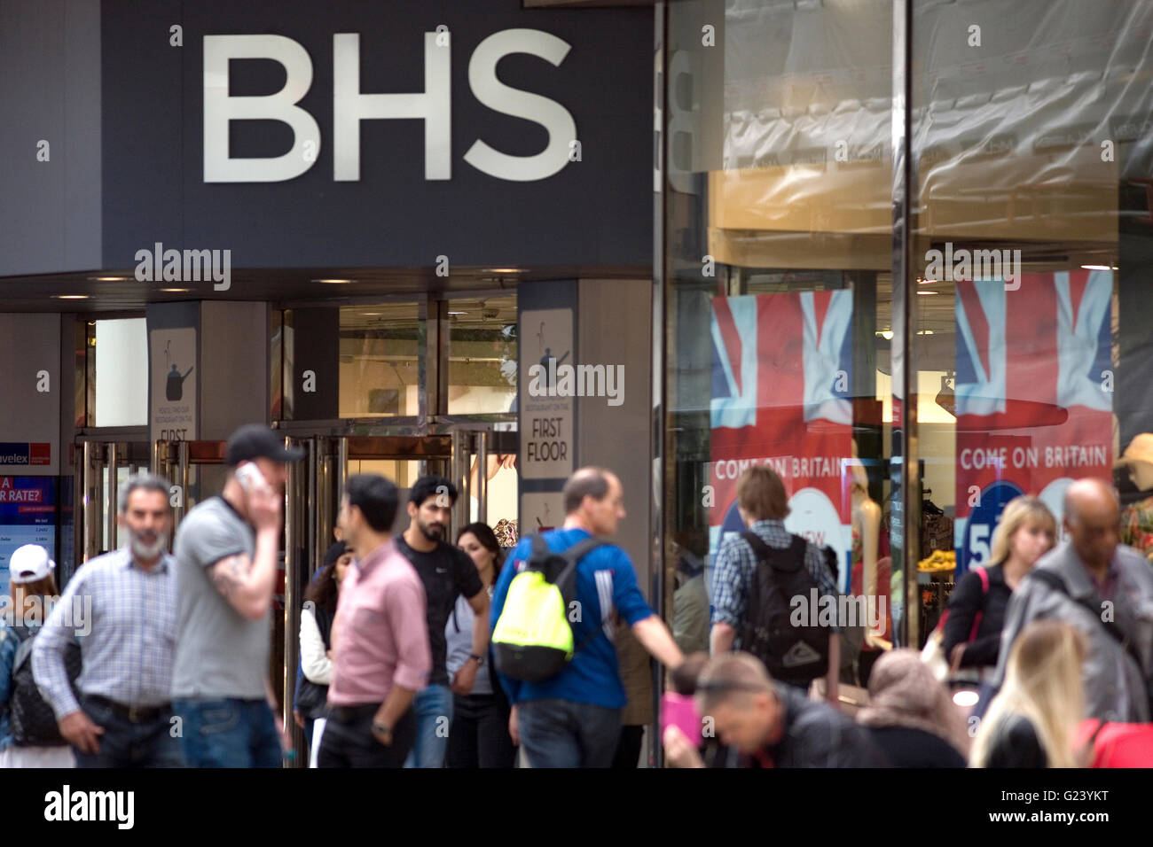 Pedestrians walk past the BHS department store in Oxford Street, London ...