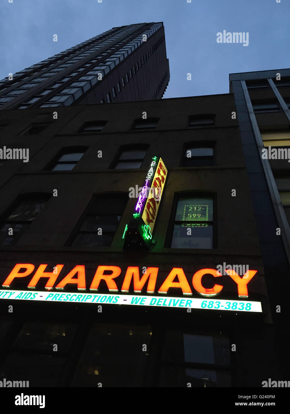 Pharmacy Facade Neon Signs at Dusk, NYC, USA Stock Photo - Alamy