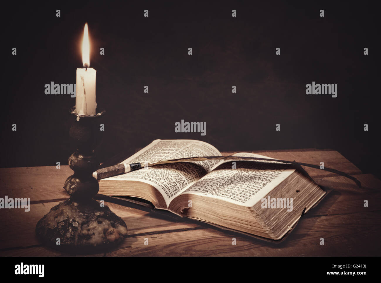 Old fashioned backgrounds with opened Holy Bible Stock Photo - Alamy