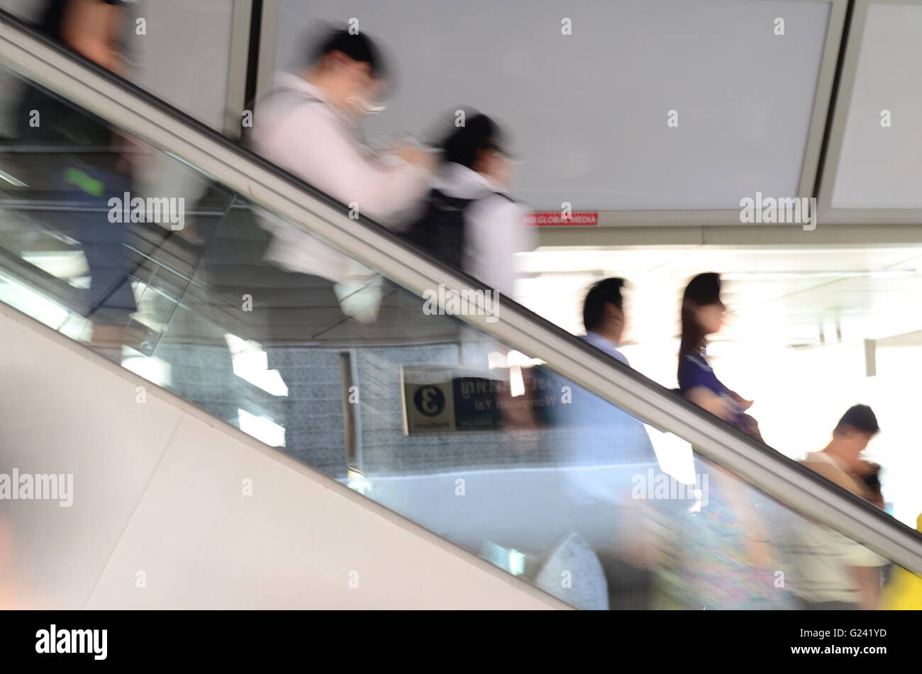 On an escalator hi-res stock photography and images - Alamy