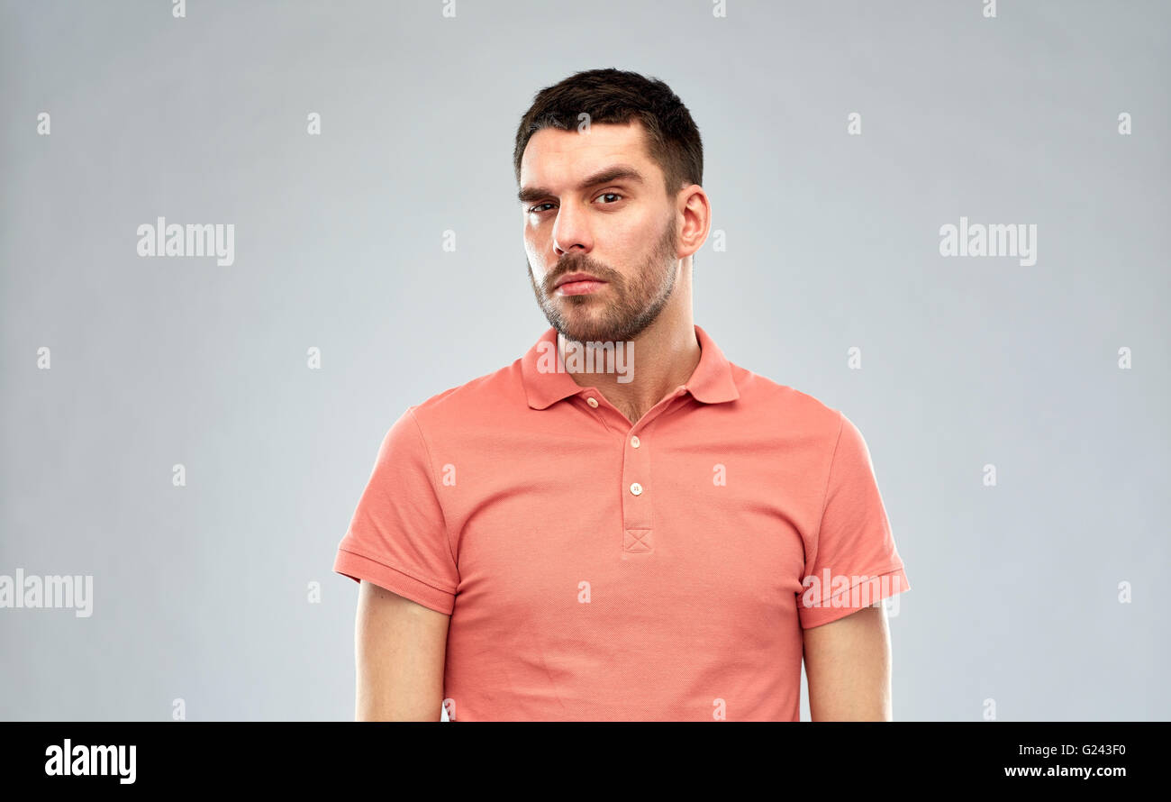 man thinking over gray background Stock Photo - Alamy