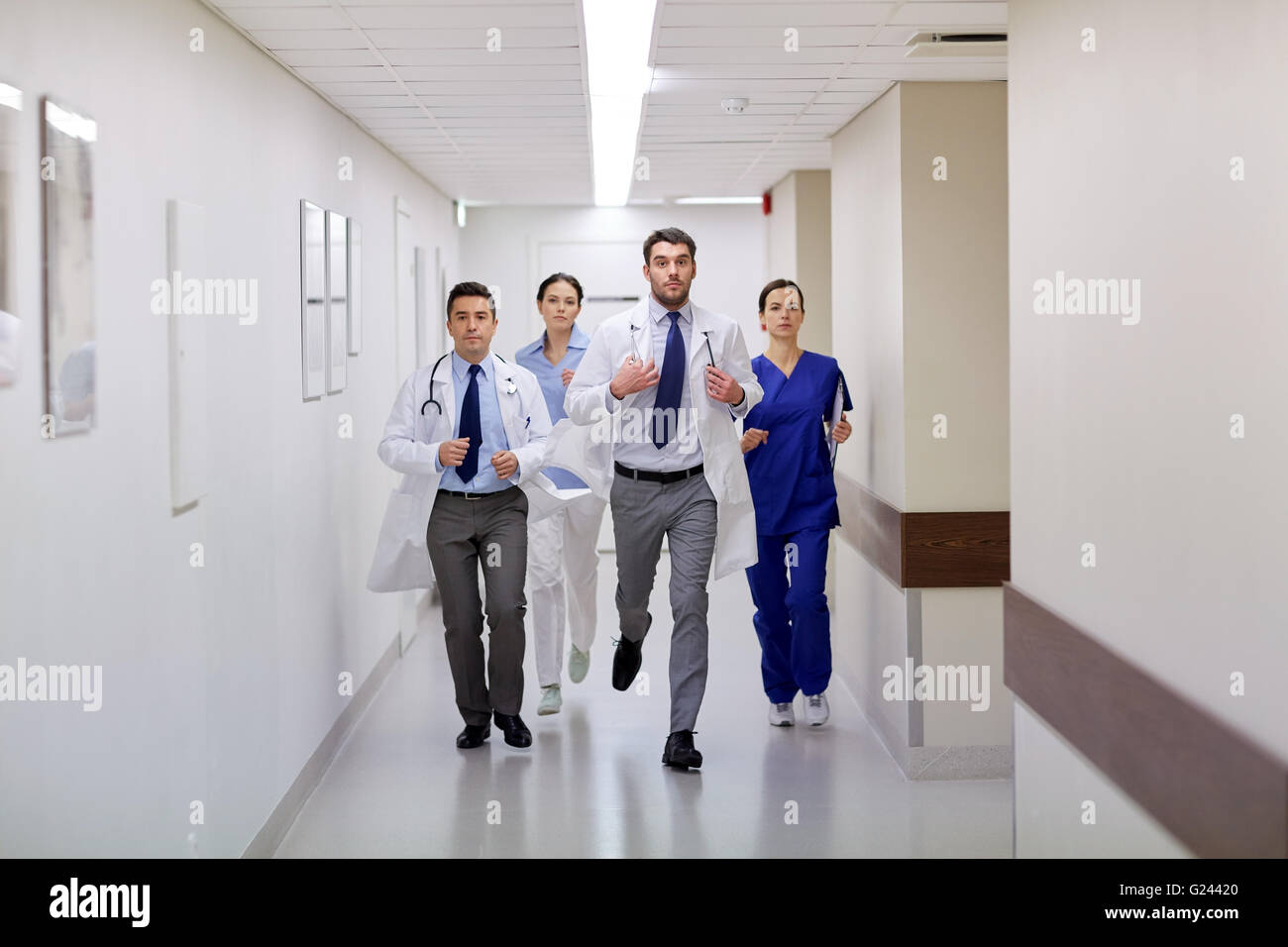 group of medics walking along hospital Stock Photo - Alamy