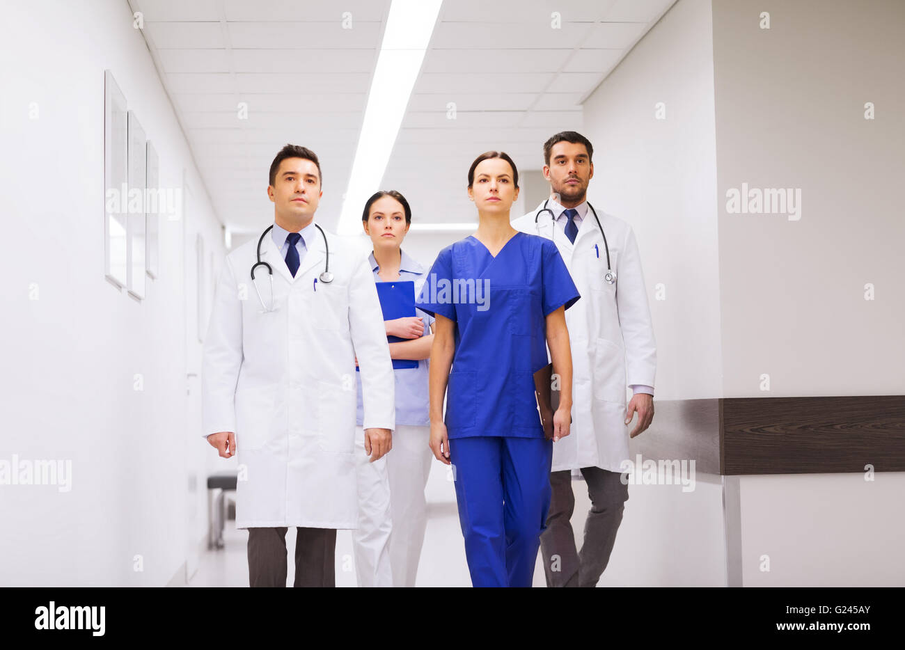 group of medics or doctors at hospital corridor Stock Photo - Alamy