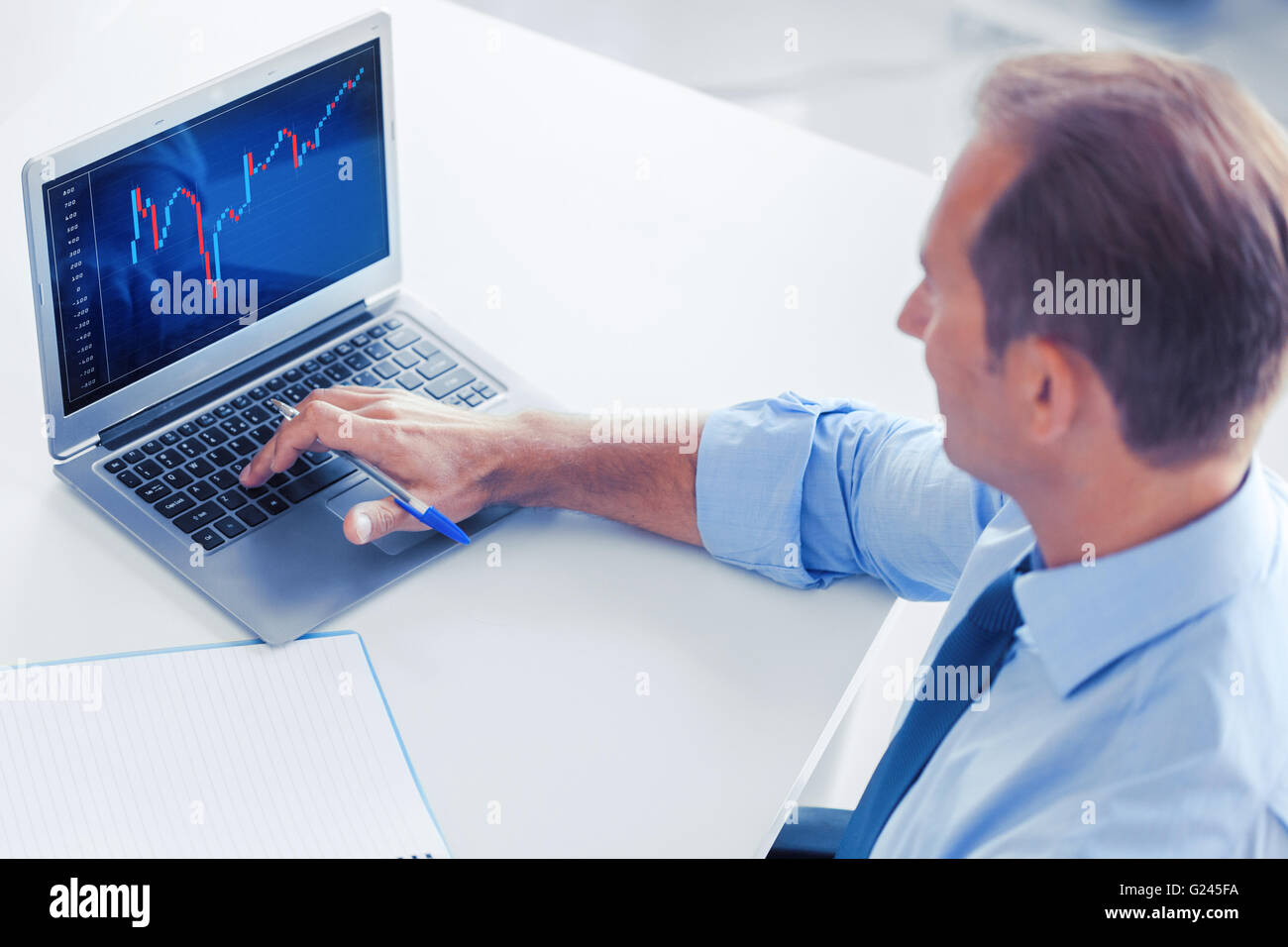 businessman working with forex chart in office Stock Photo - Alamy