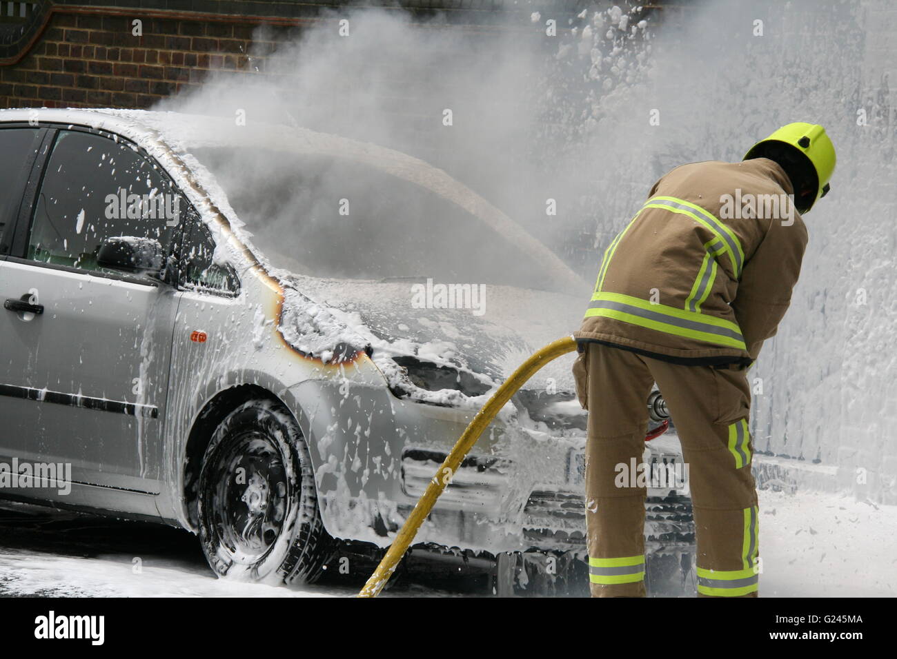 Fire engine hose uniform hi-res stock photography and images - Alamy