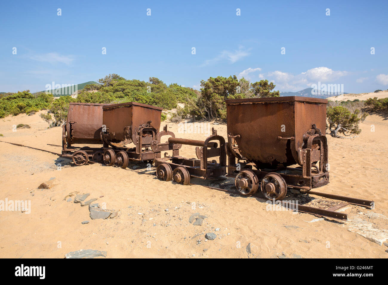 Tippers or tipping wagons on old mine tracks in the dunes, Dune di ...