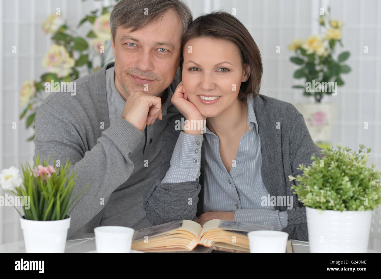 Portrait attractive married couple sitting hi-res stock photography and ...