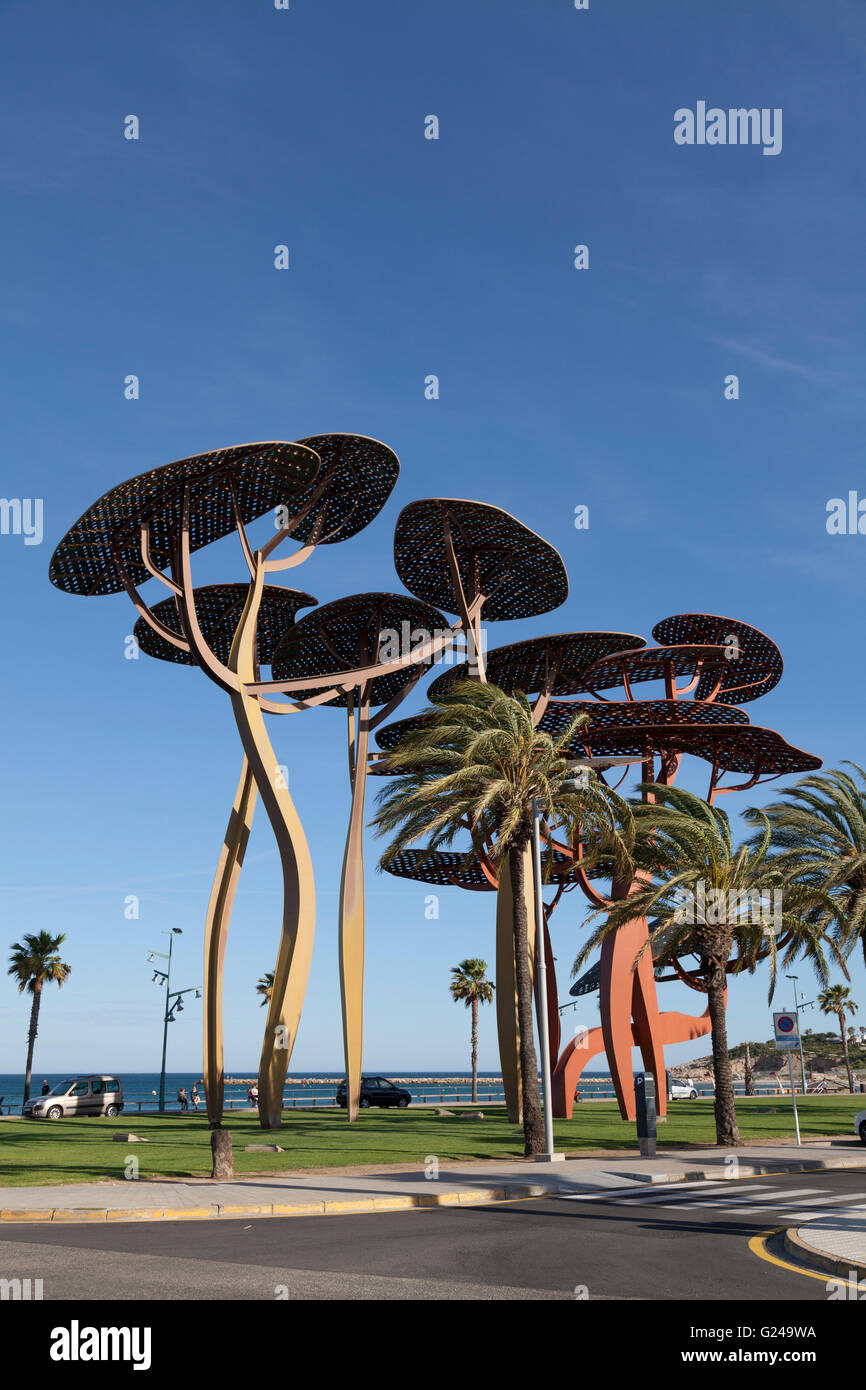 Large pine tree sculpture on the promenade of La Pineda, Platja de la ...