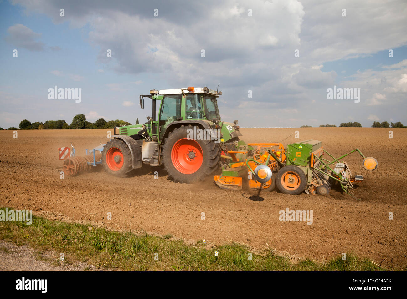 Side view of tractor with plough hi-res stock photography and images ...