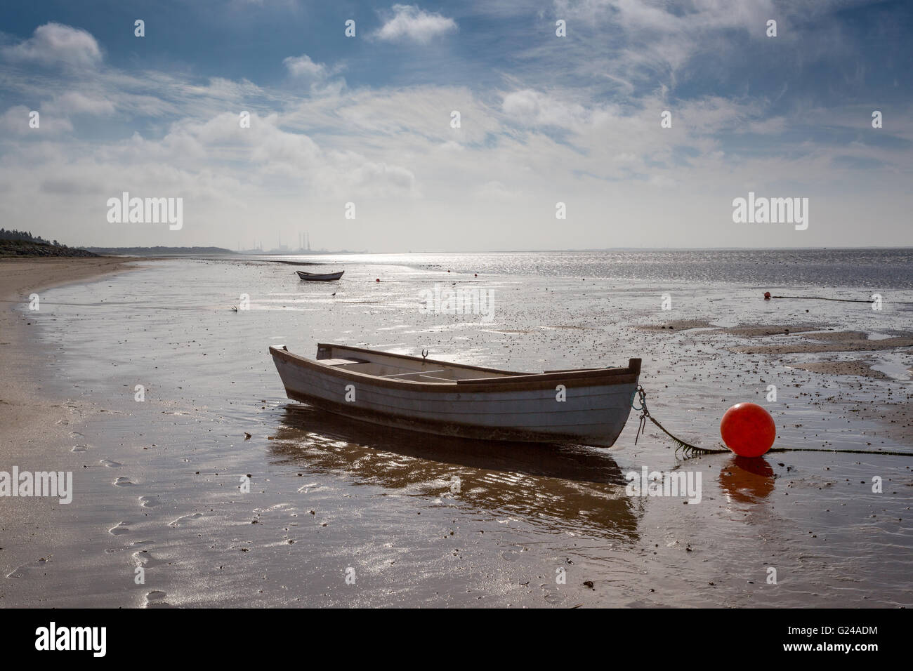Hjerting, Denmark. Small boats on Hjerting beach with Esbjerg in the ...