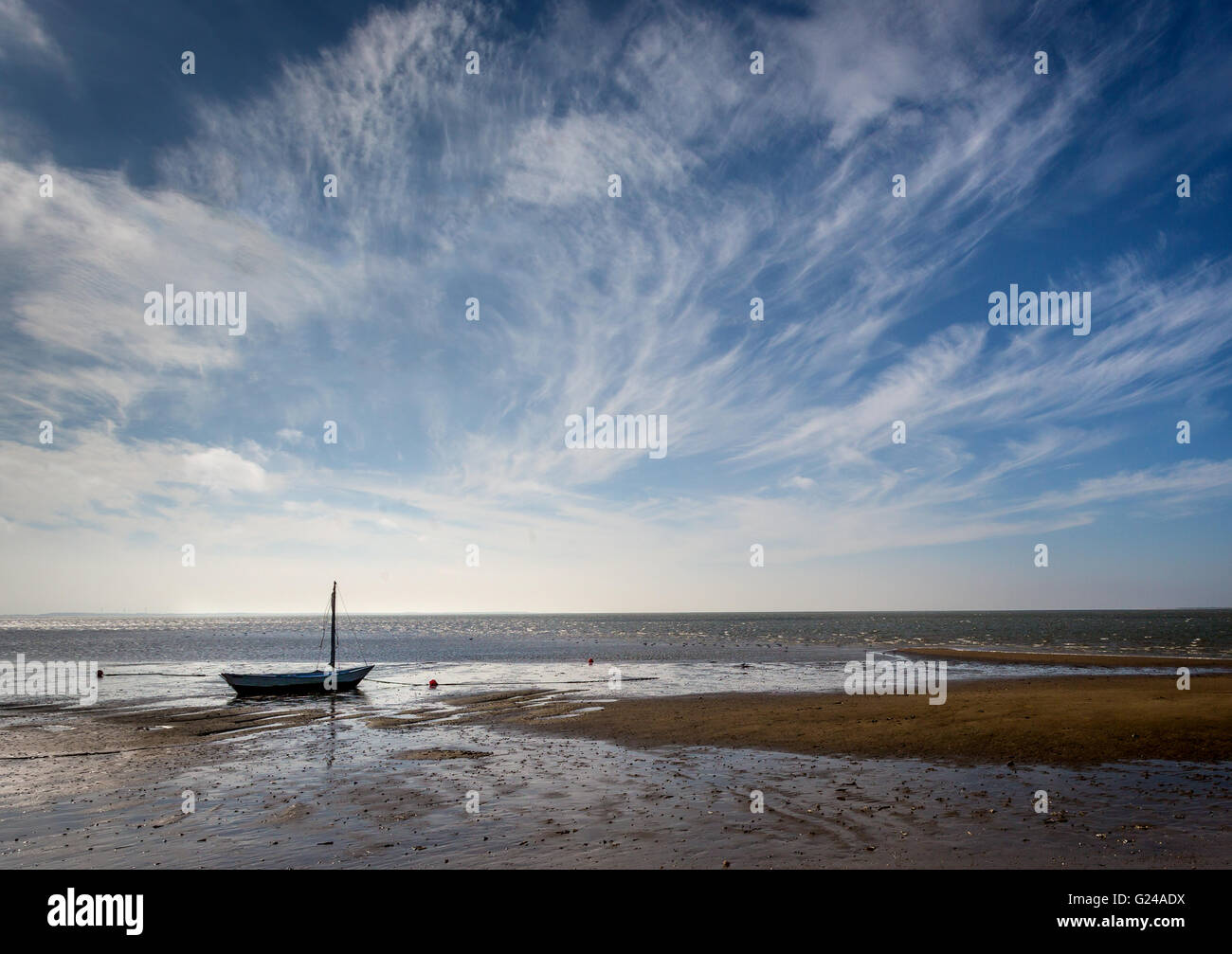 Hjerting, Denmark. Small boats on Hjerting beach with Esbjerg in the ...