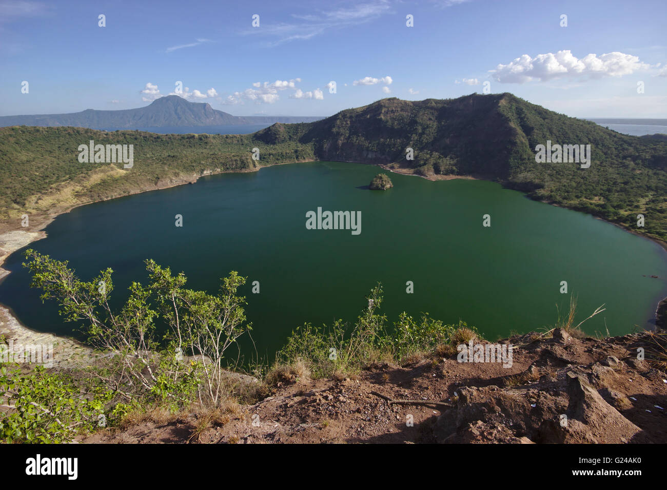 Crater lake in the main crater of Taal Volcano, with Lake Taal in the ...