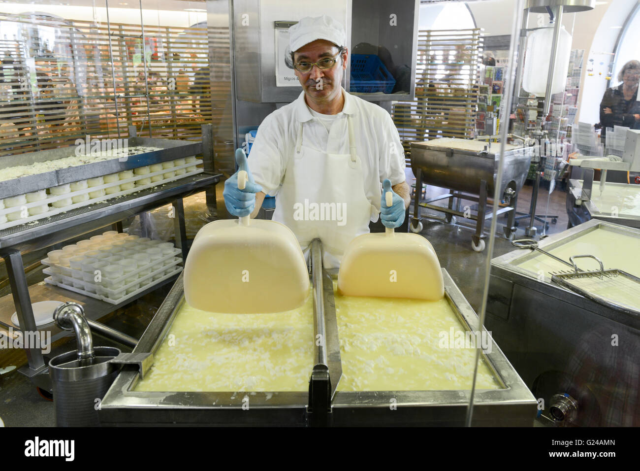 Swiss cheesemaker traditional cheese hi-res stock photography and ...