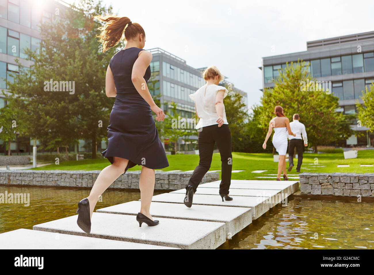 Group running office hi-res stock photography and images - Alamy