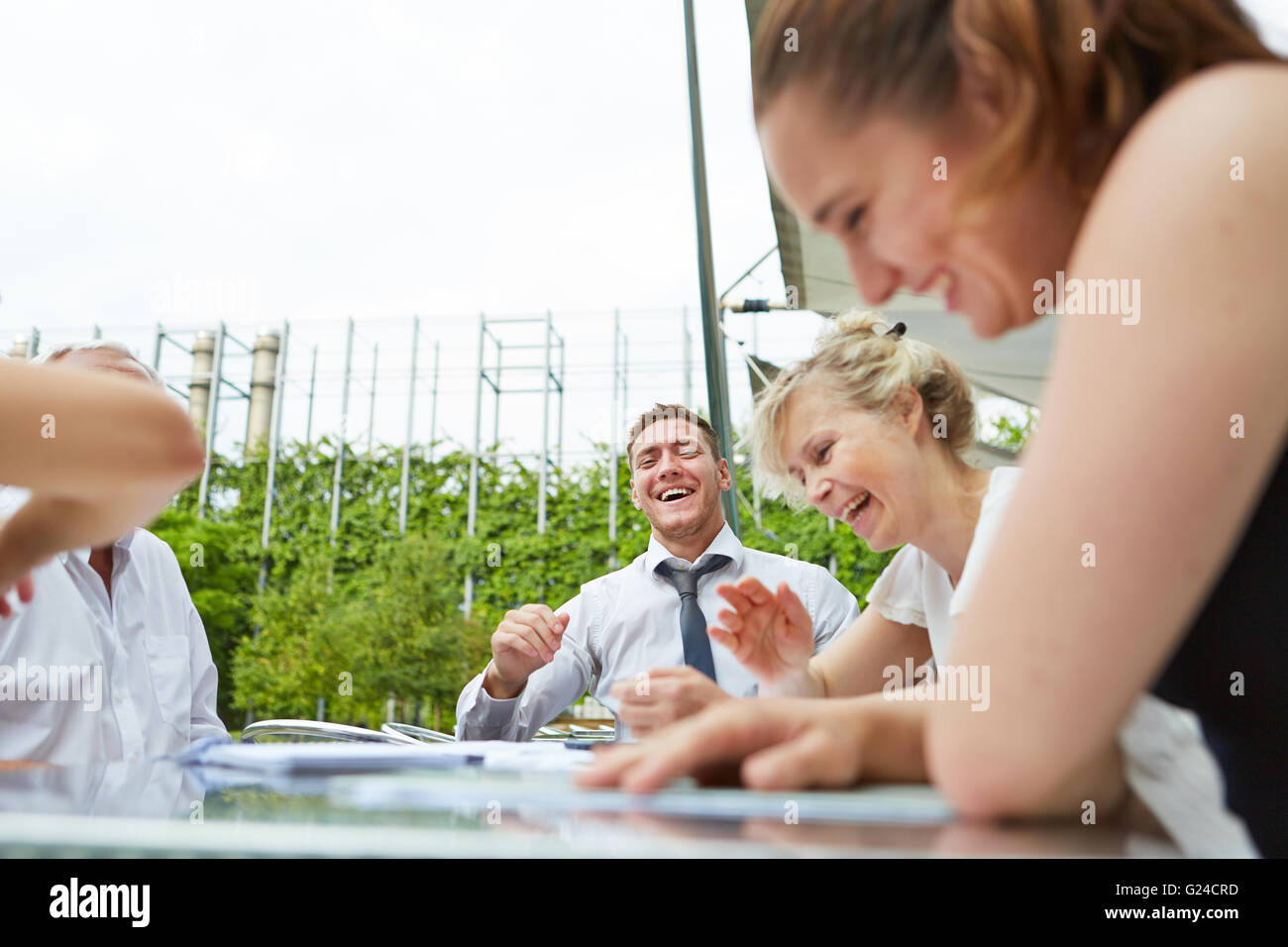 Business colleagues laughing hi-res stock photography and images - Alamy