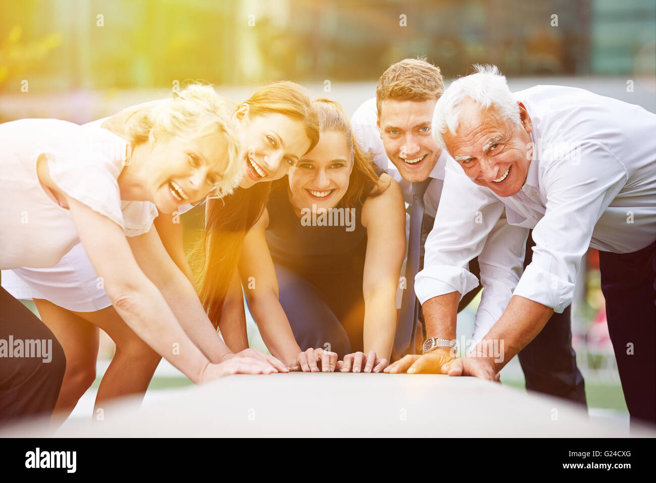 Strength of team work hi-res stock photography and images - Alamy