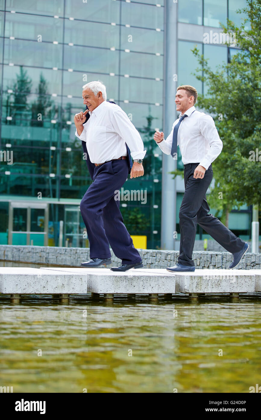 Employee running together hi-res stock photography and images - Alamy