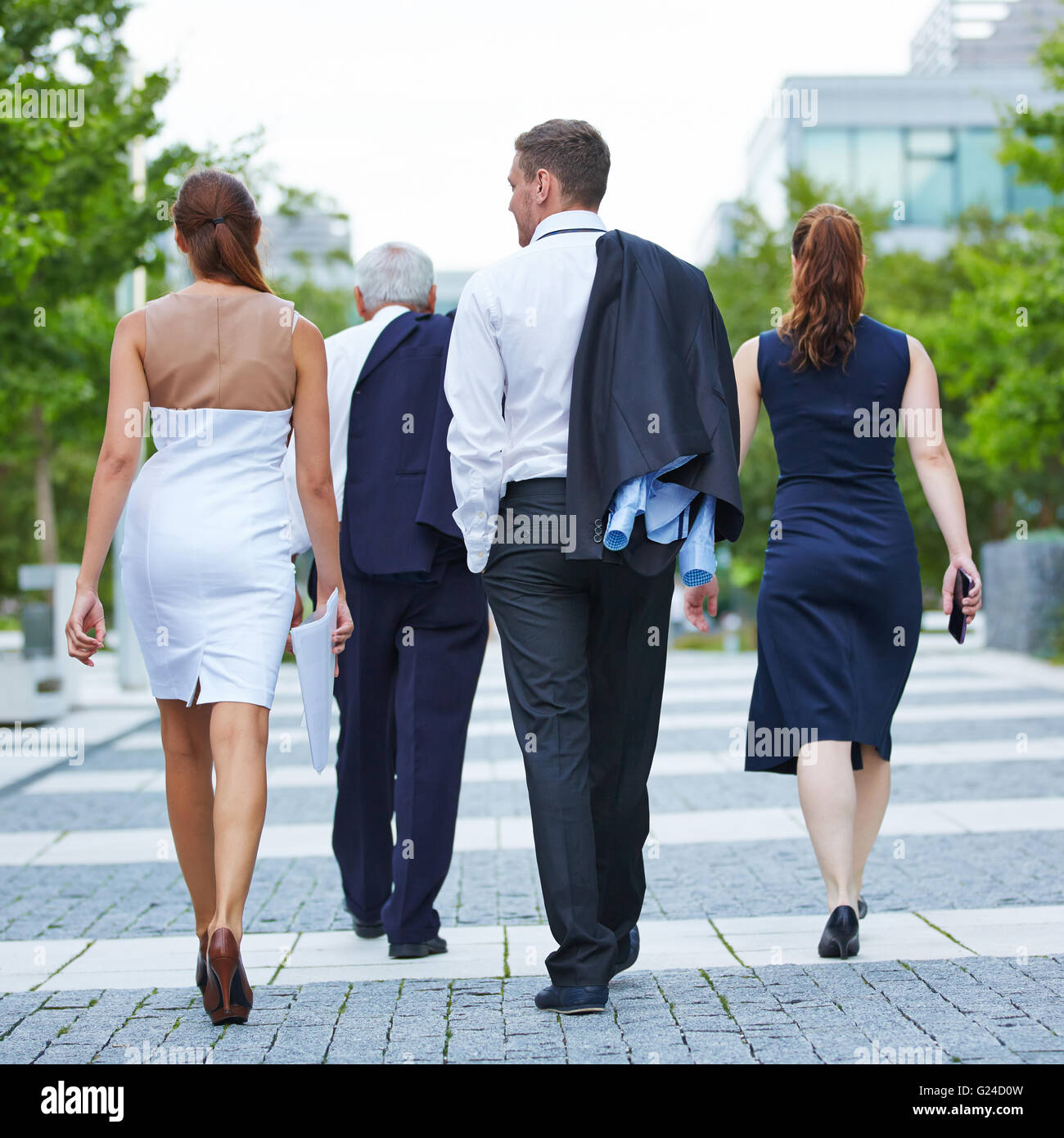 Walking business people back hi-res stock photography and images - Alamy