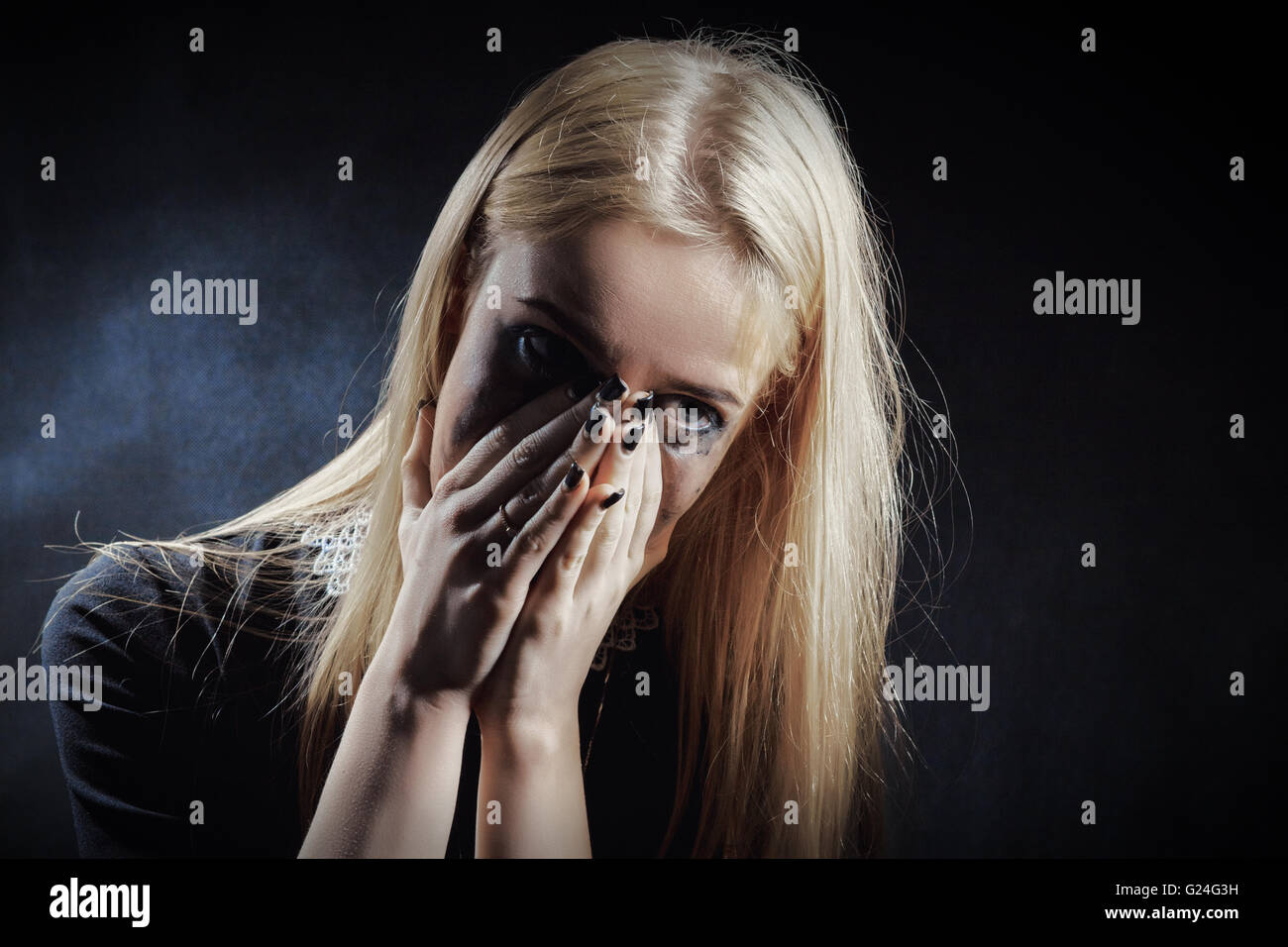 sad shocked girl crying on black background Stock Photo - Alamy