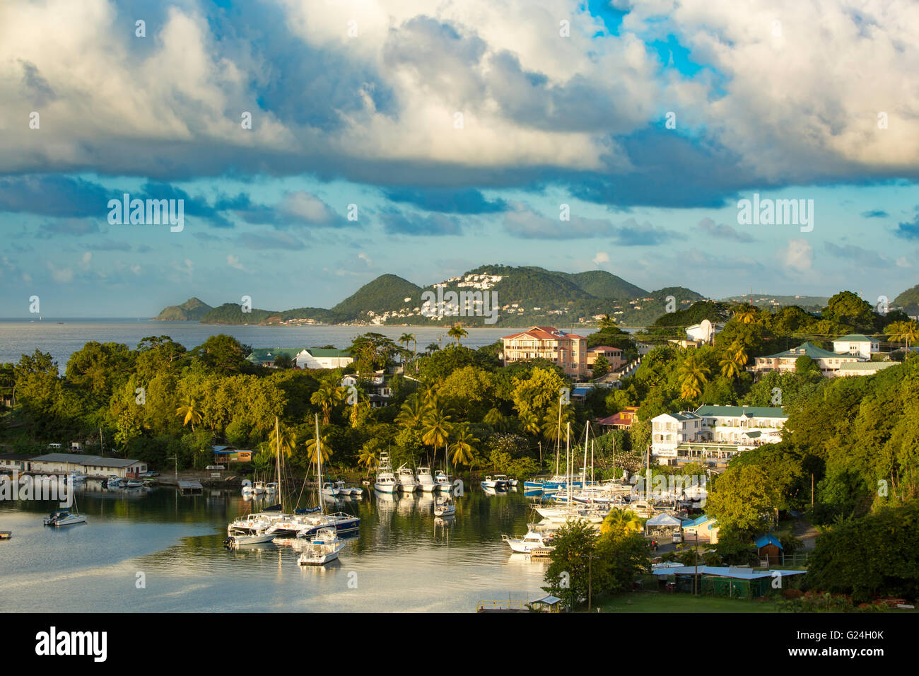 Setting sunlight over the tiny harbor in Castries, St Lucia, West ...