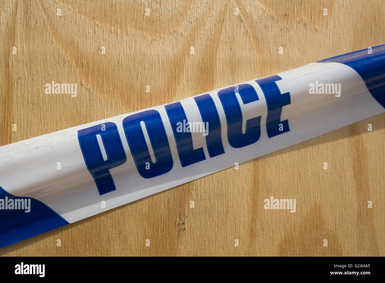 Police Tape on Broken Window Stock Photo - Alamy