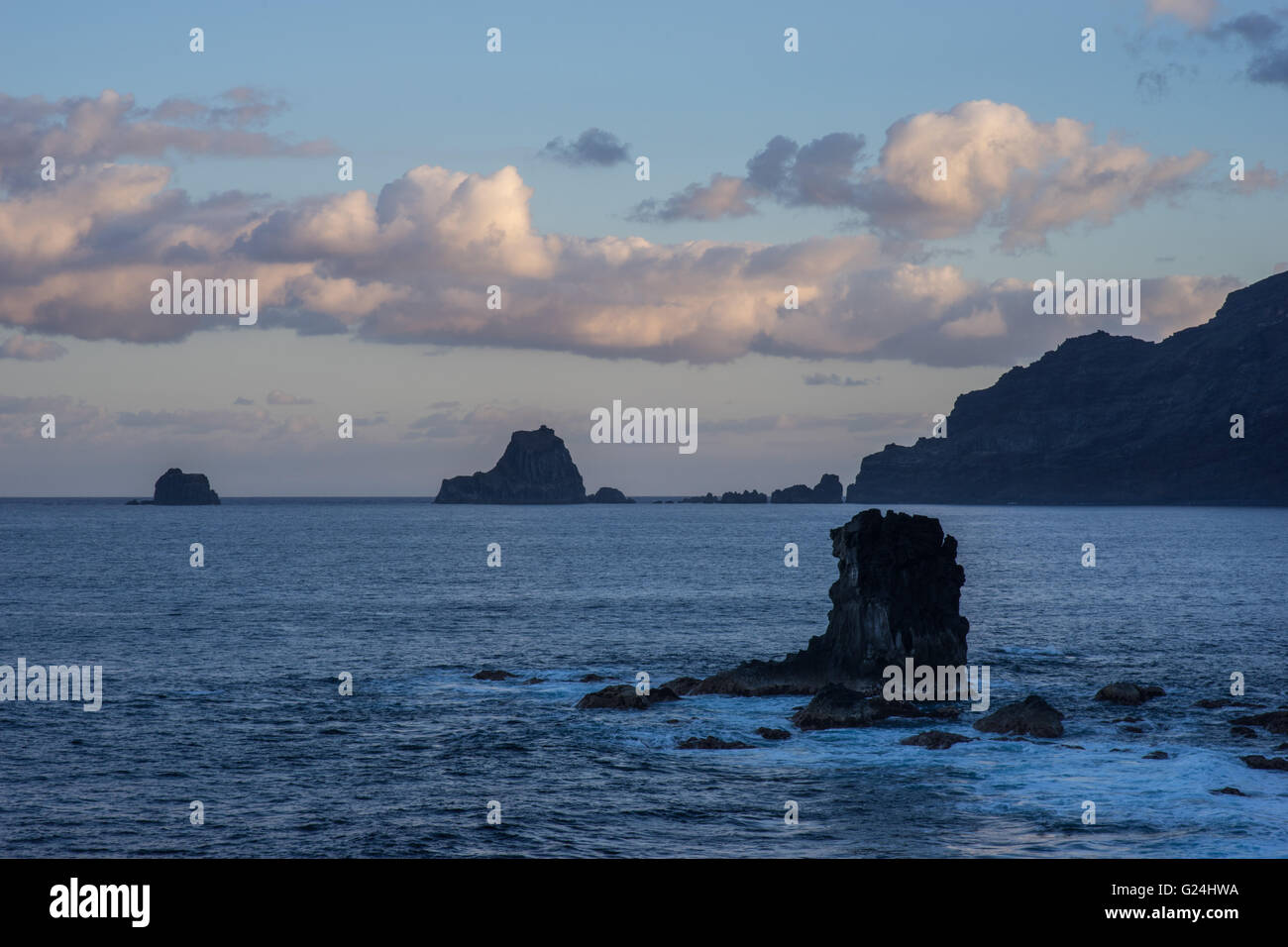 Rock islet at sunrise. El Hierro Stock Photo - Alamy
