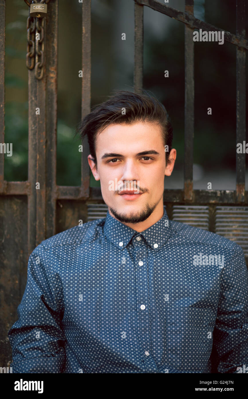 Young handsome man dark hi-res stock photography and images - Alamy