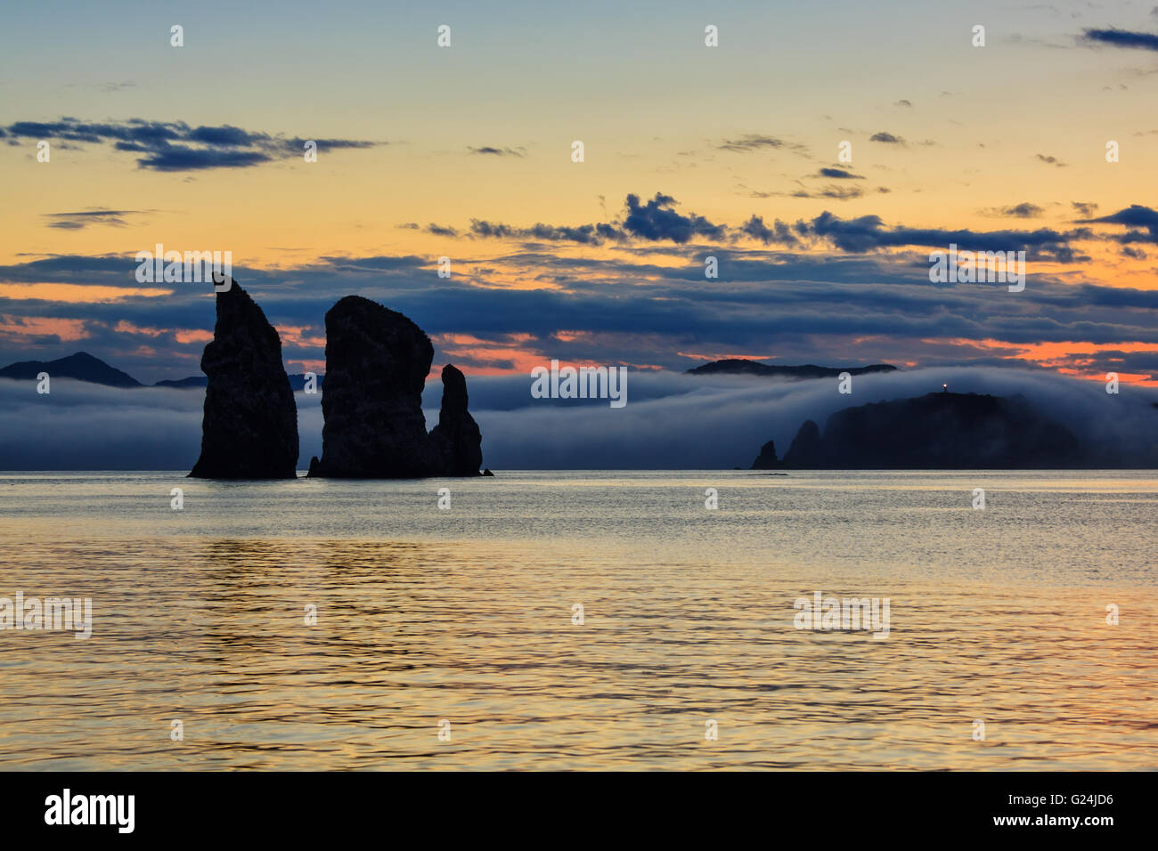 Picturesque Kamchatka landscape: view of Three Brothers Rocks in ...