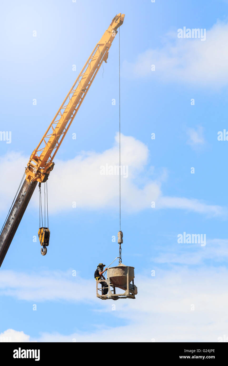 Crane in building construction site Stock Photo - Alamy