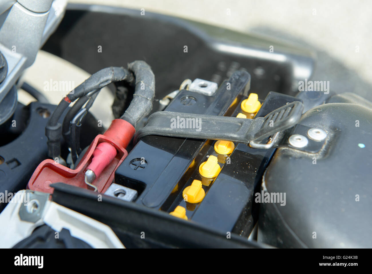 an installation of the motorbike battery Stock Photo - Alamy