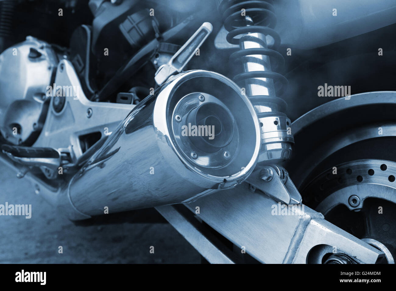 The working muffler of a modern motorcycle Stock Photo - Alamy