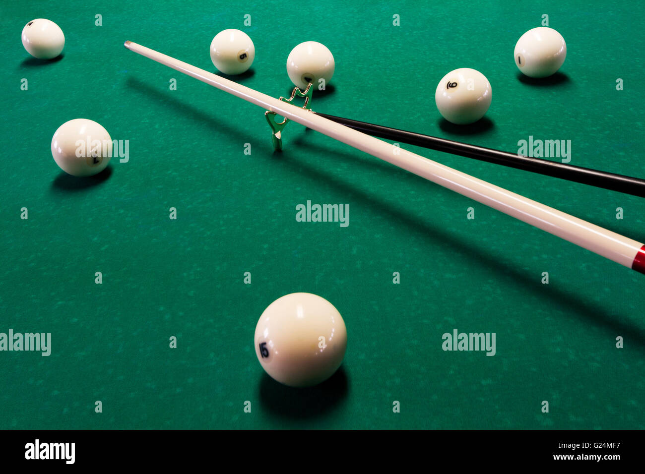 balls and the cue on the pool table Stock Photo - Alamy