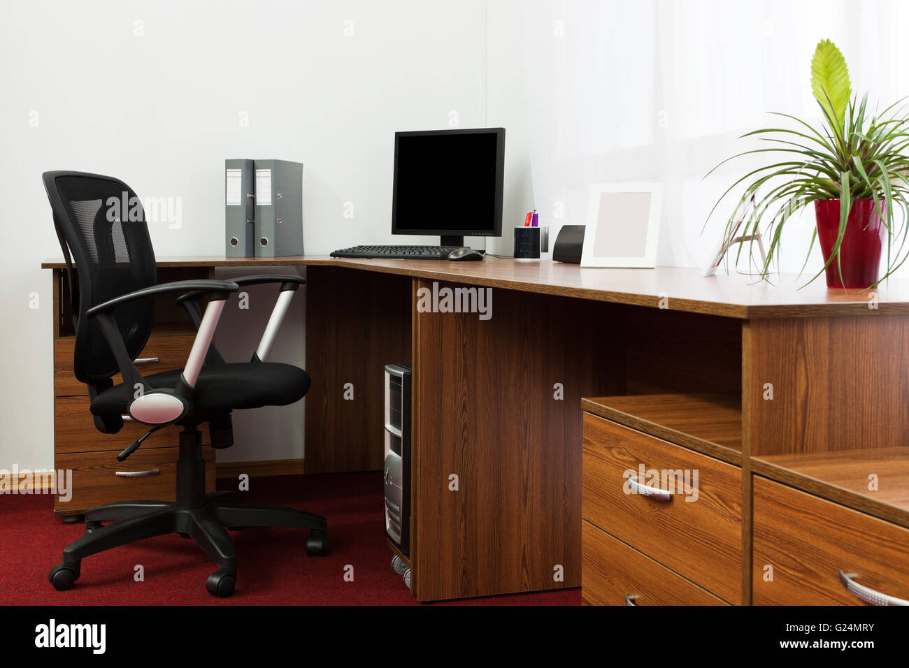 The computer on a desk at modern office Stock Photo - Alamy