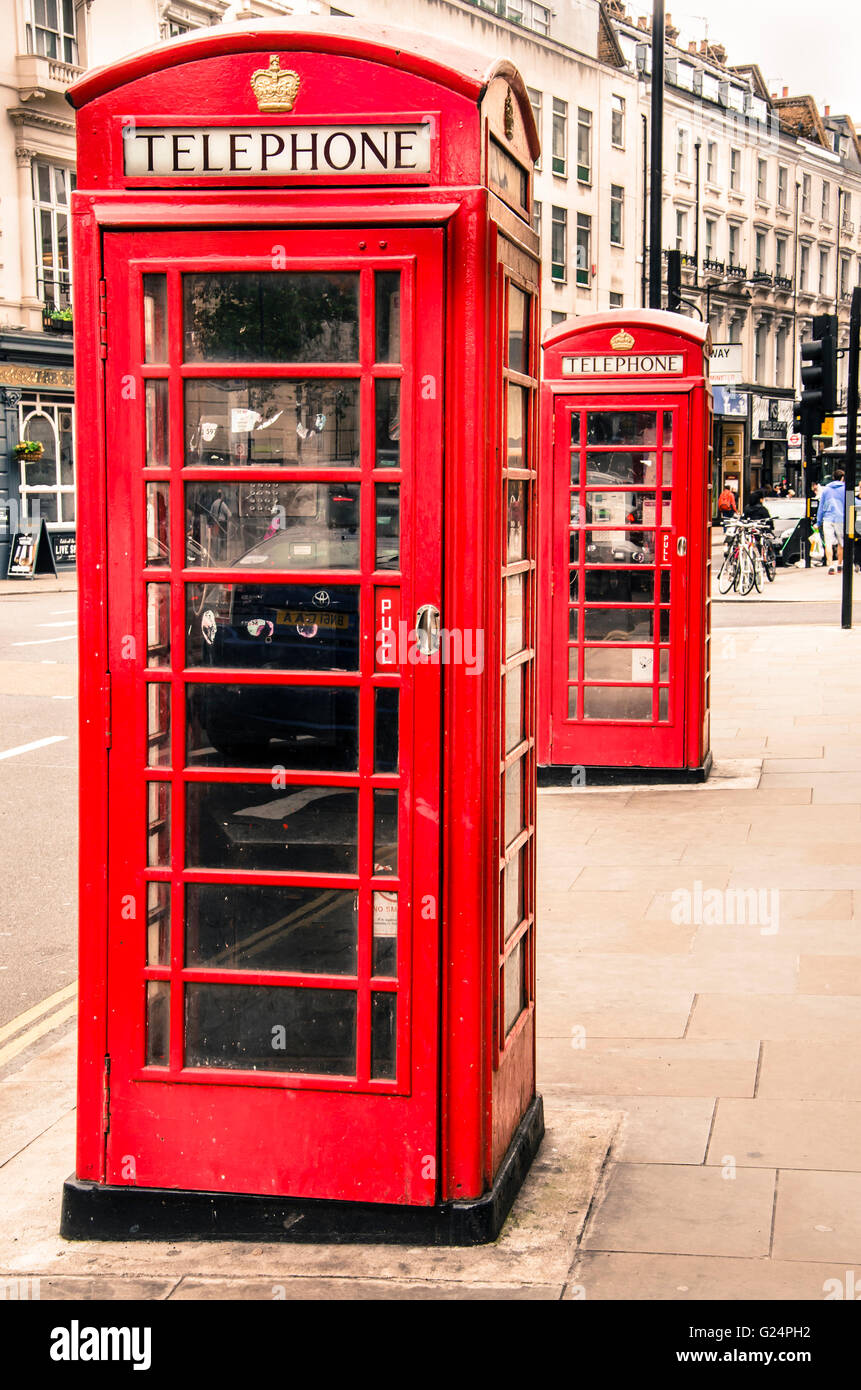 Red telephone boxes on Bishop's Bridge Road, Bayswater, London Stock ...