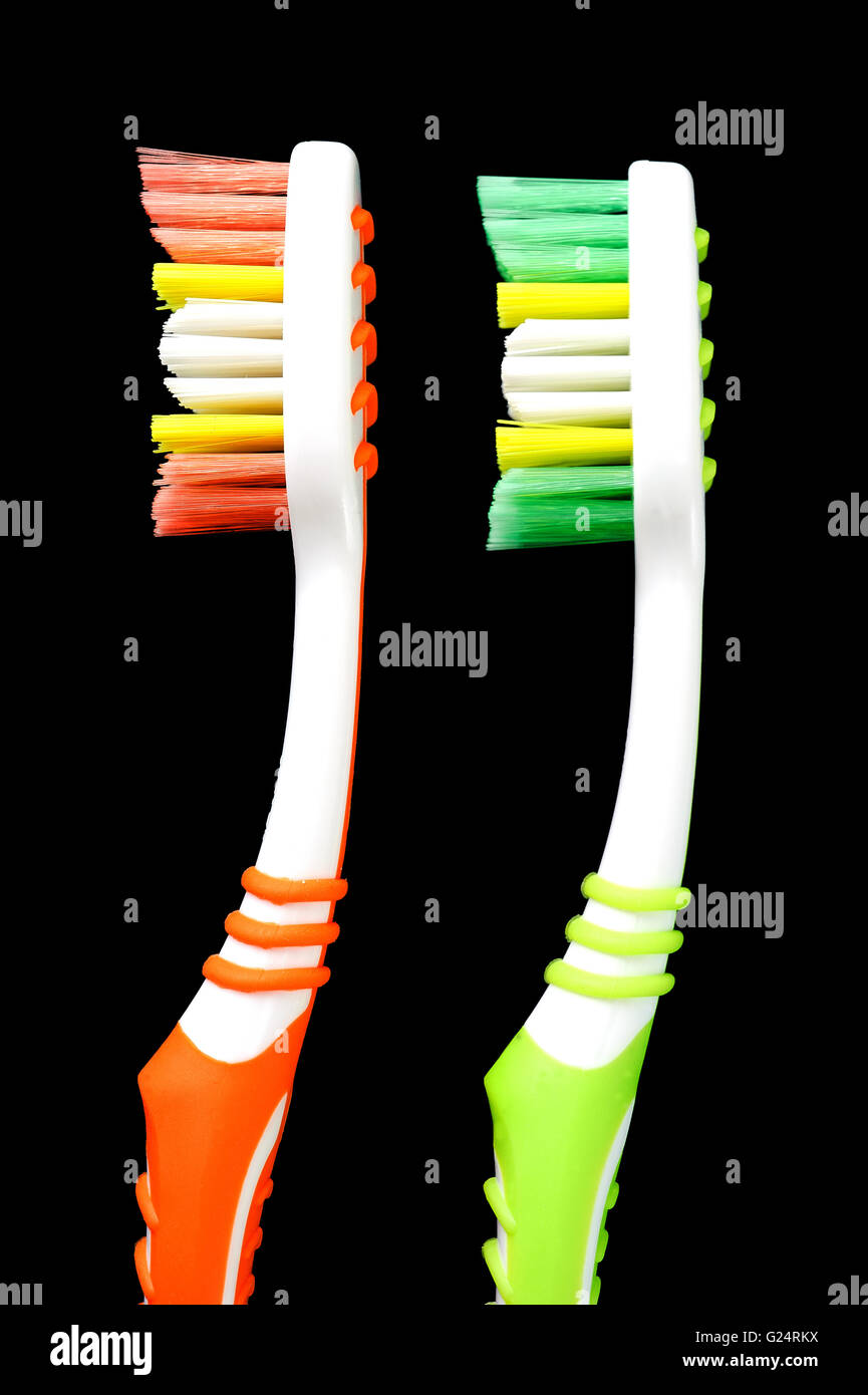 Two Toothbrushes isolated on black Stock Photo - Alamy