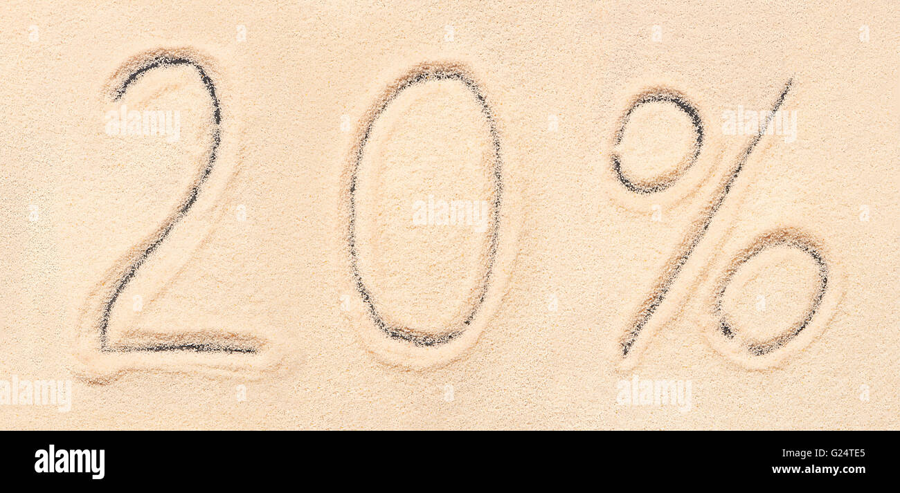 20 % lettering written on sand. Summer beach background Stock Photo - Alamy