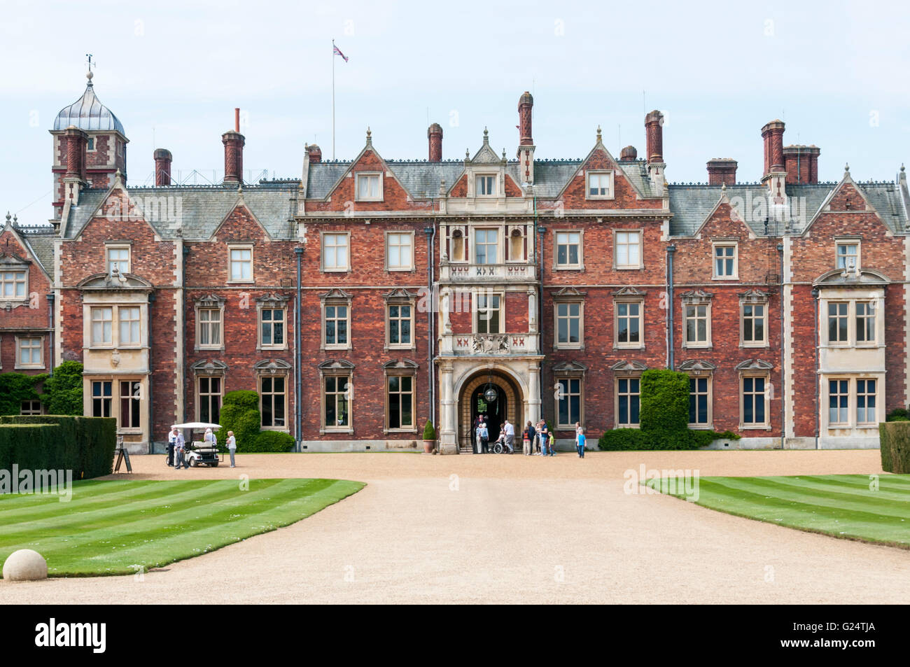 The north front entrance to Sandringham House with a tour party ...